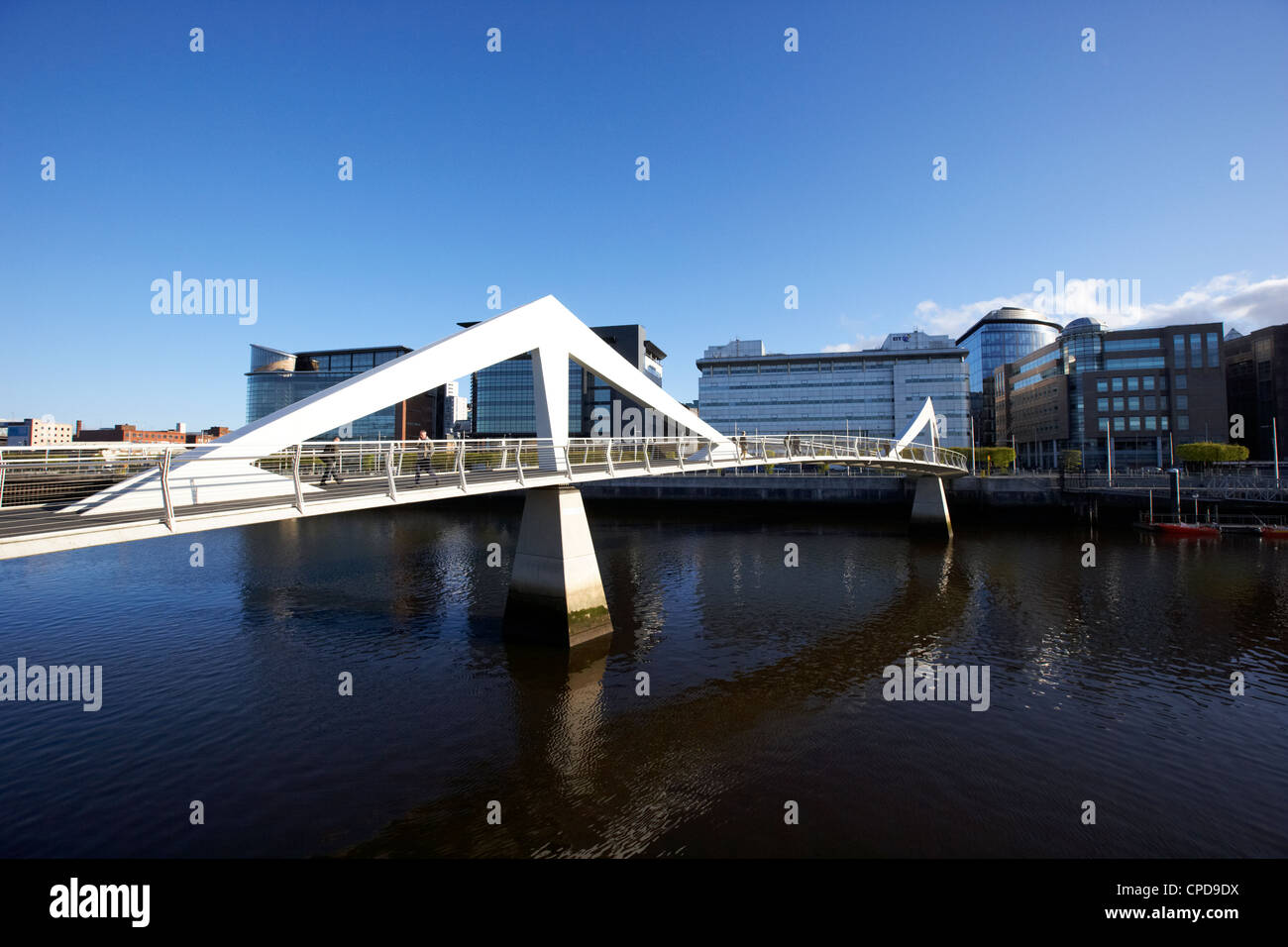 The tradeston bridge pedestrian bridge over the river clyde to the ...