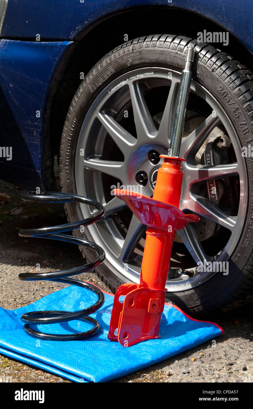 Macpherson suspension strut shock absorber and road spring Stock Photo ...