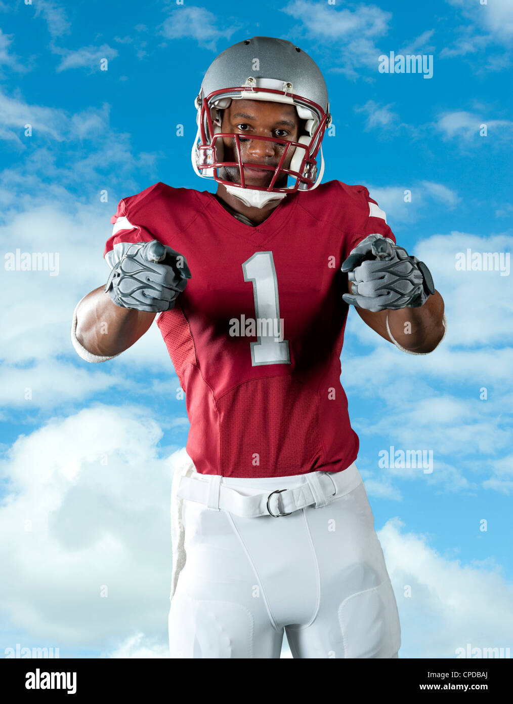 Black football player pointing Stock Photo - Alamy