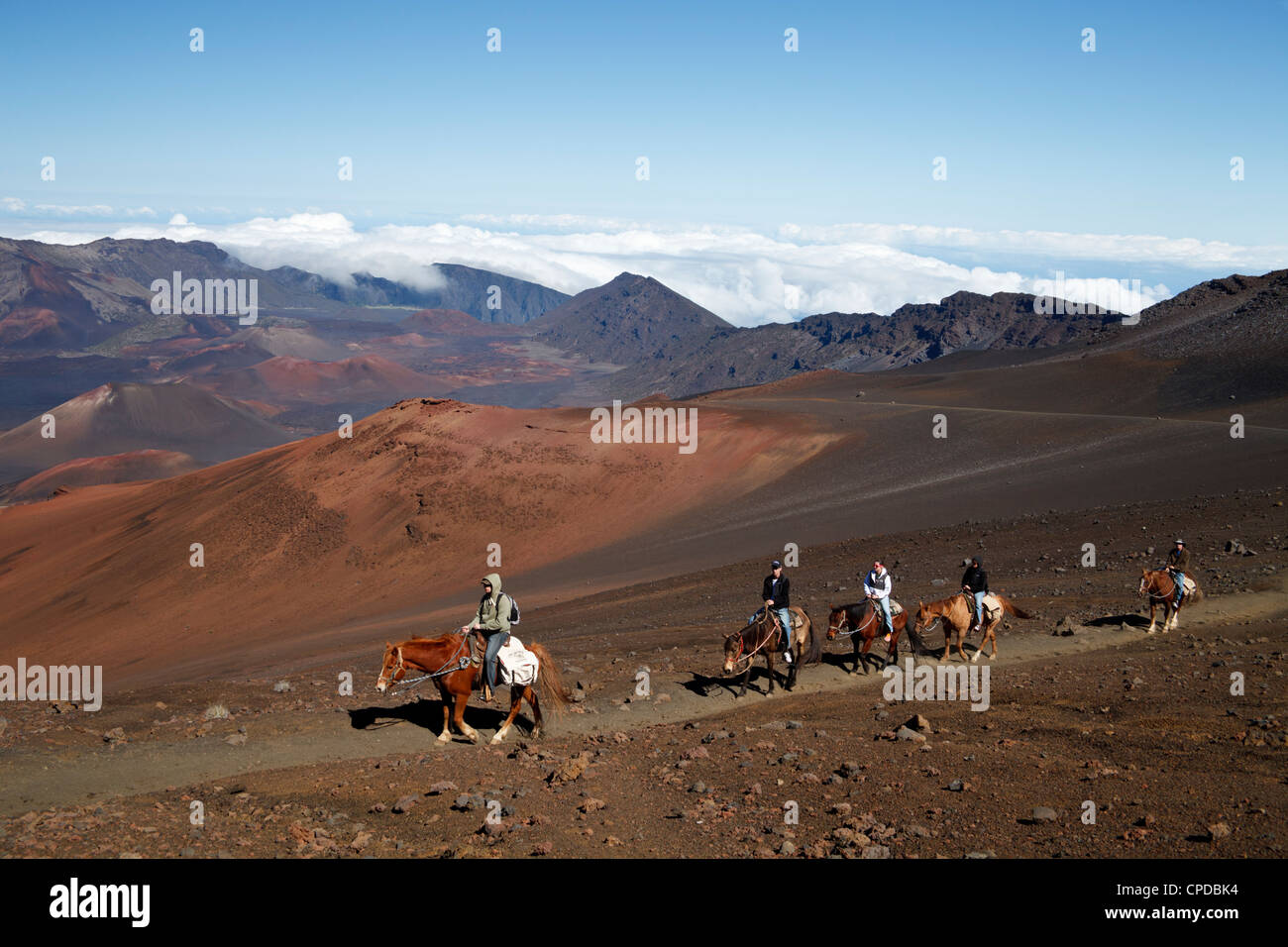 Horseback riders on the Sliding Sands Trail at Haleakala National Park ...