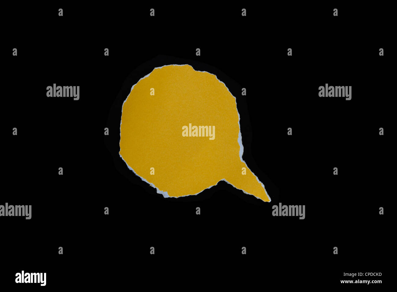 yellow paper tear bubble shape on dark background Stock Photo - Alamy