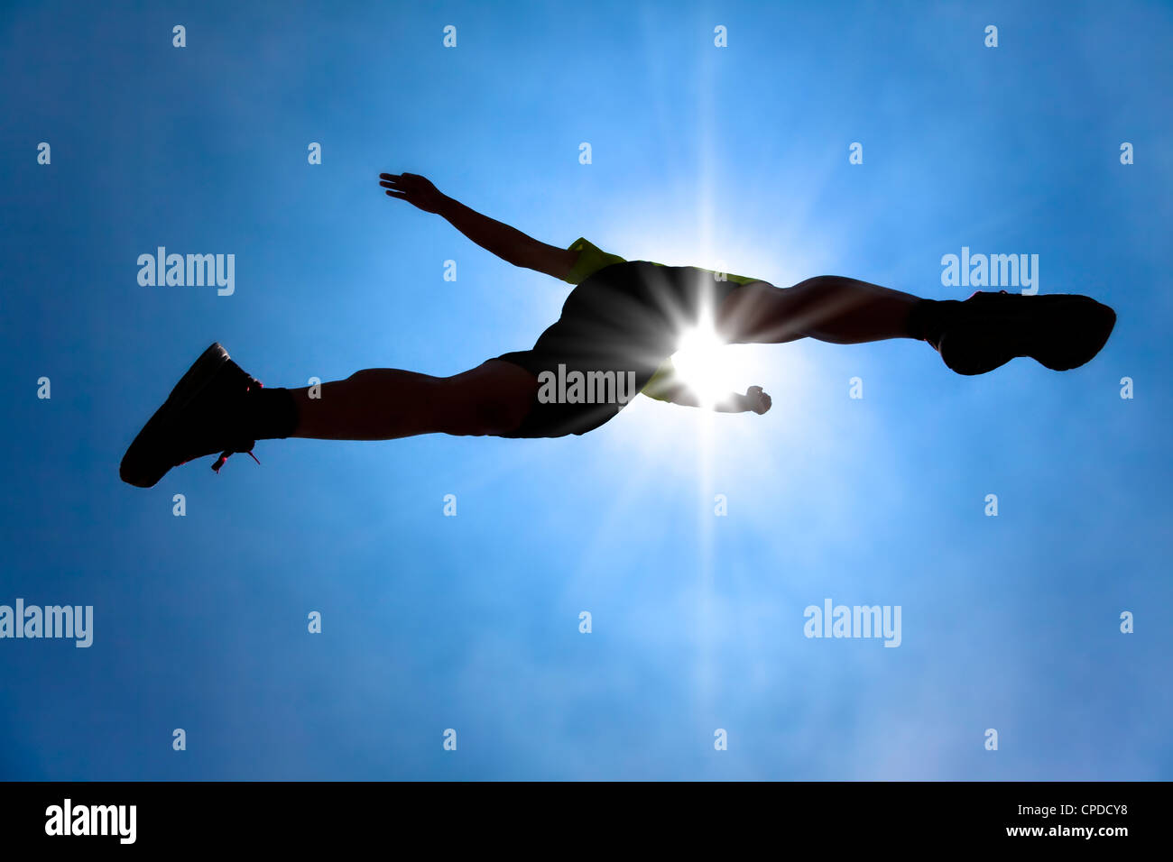 The Silhouette of runner crossing sky with sunlight background Stock ...