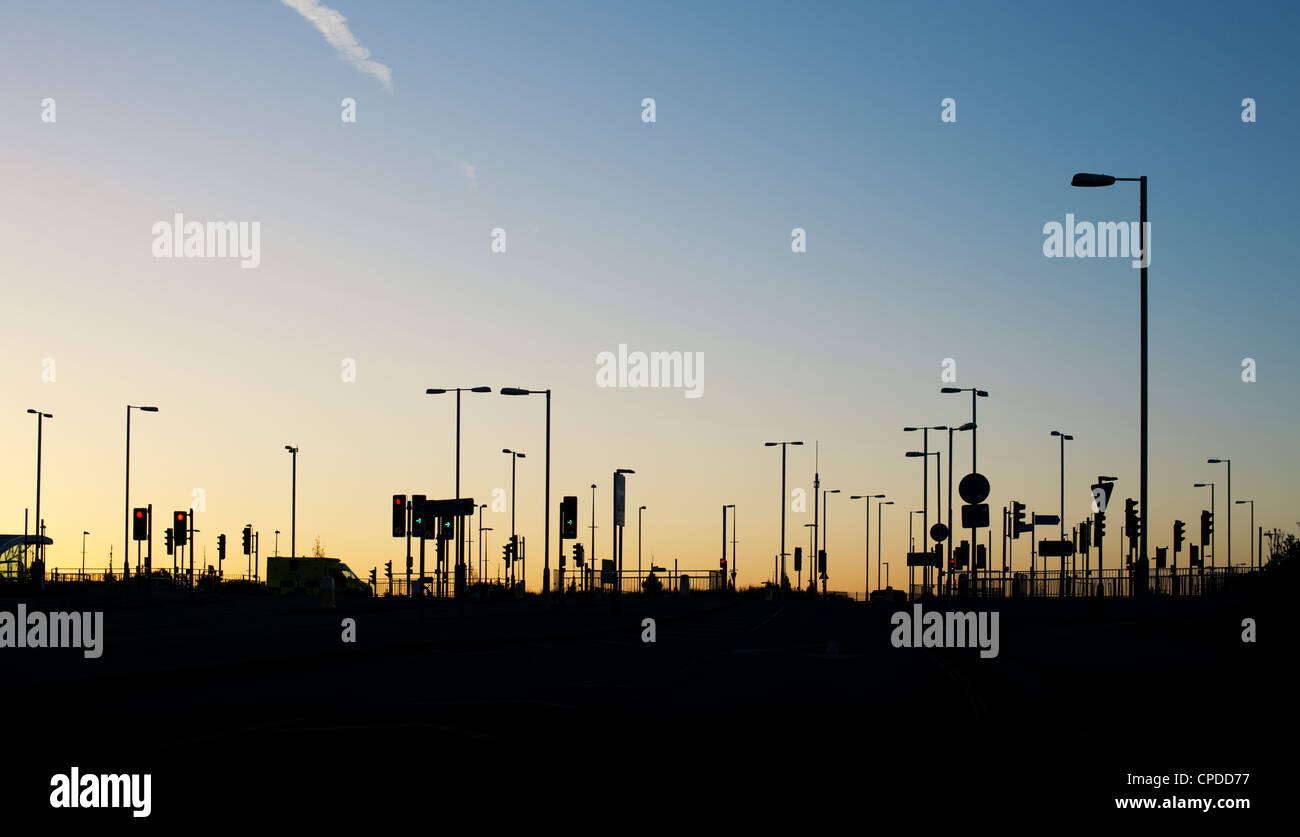 Plymouth traffic lights and street lights at a crossroads. Sunrise ...