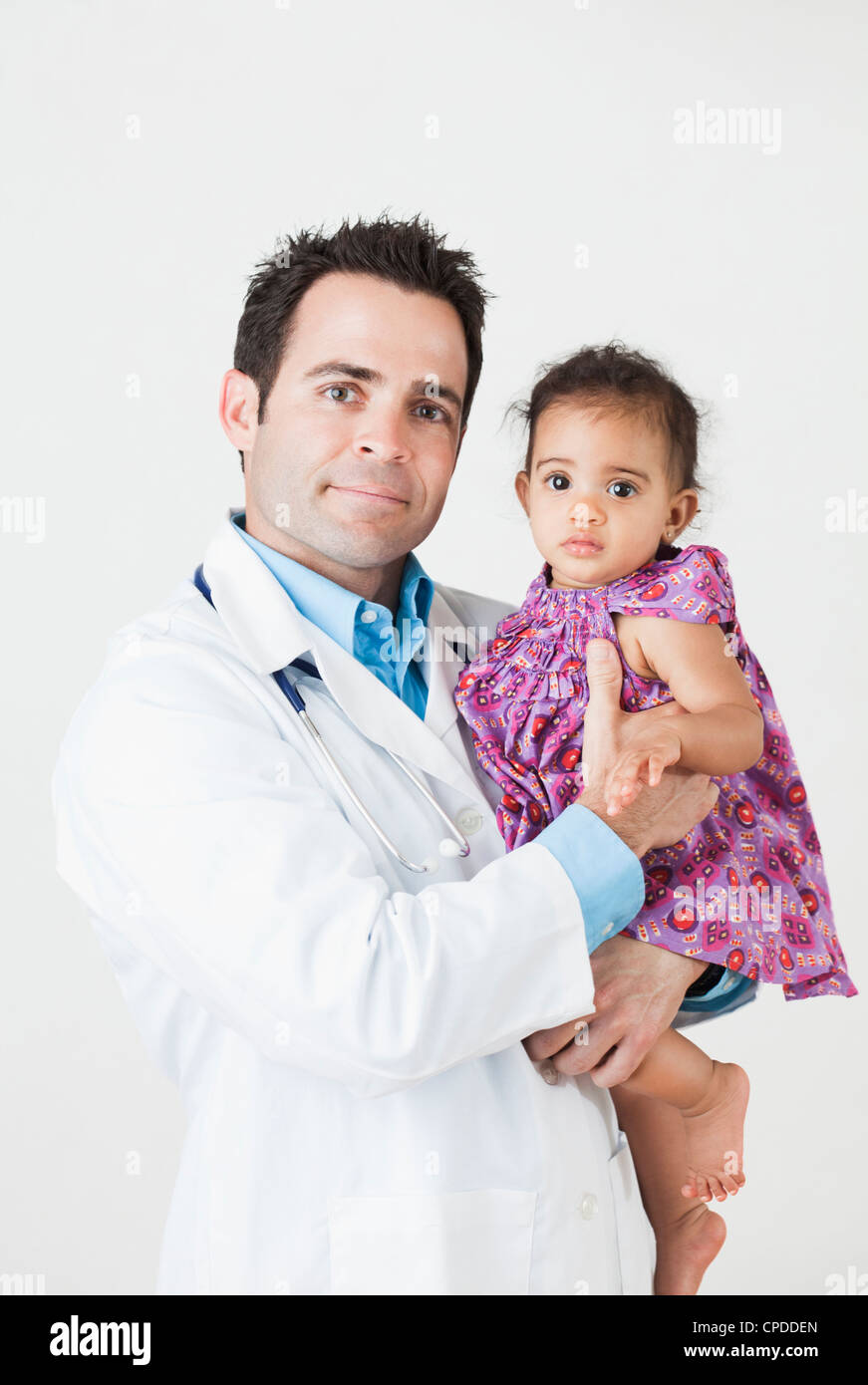 Doctor man baby studio hi-res stock photography and images - Alamy