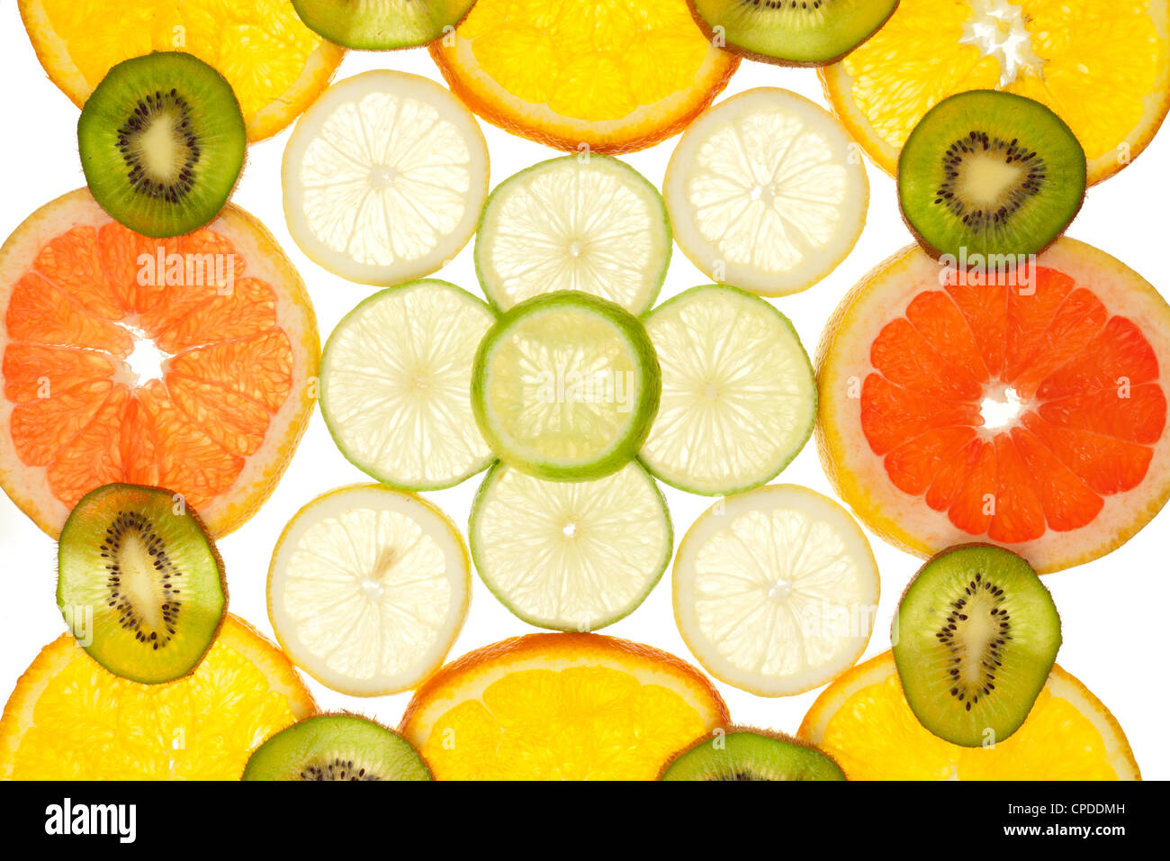 Colorful background of different fruit slices Stock Photo - Alamy