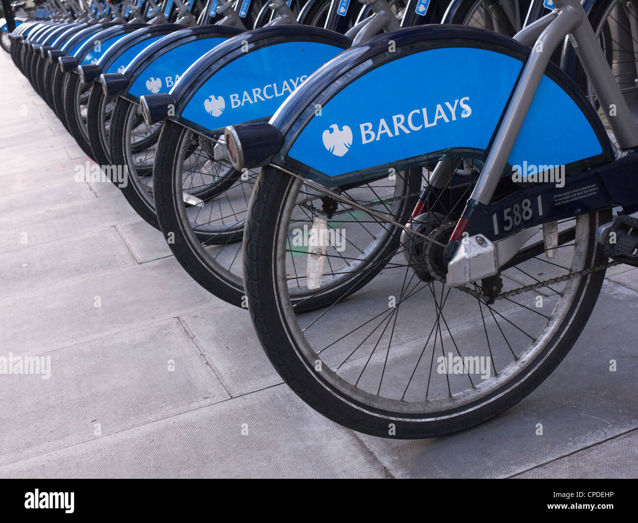 Barclays cycle bicycles in a row Stock Photo - Alamy
