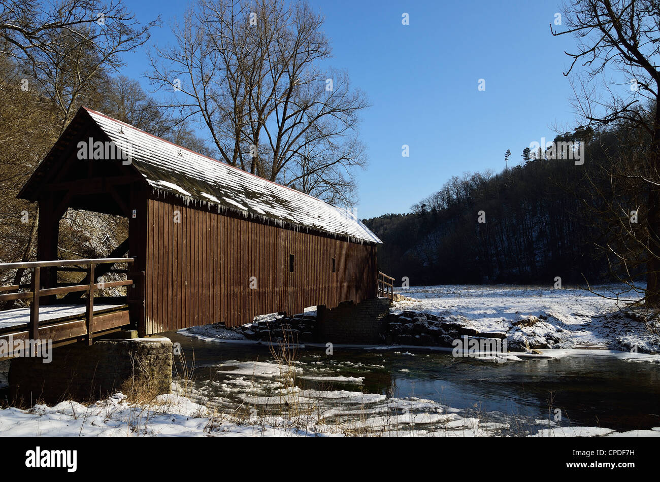 Covered bridge over the River Neckar in winter, Neckartal (Neckar ...