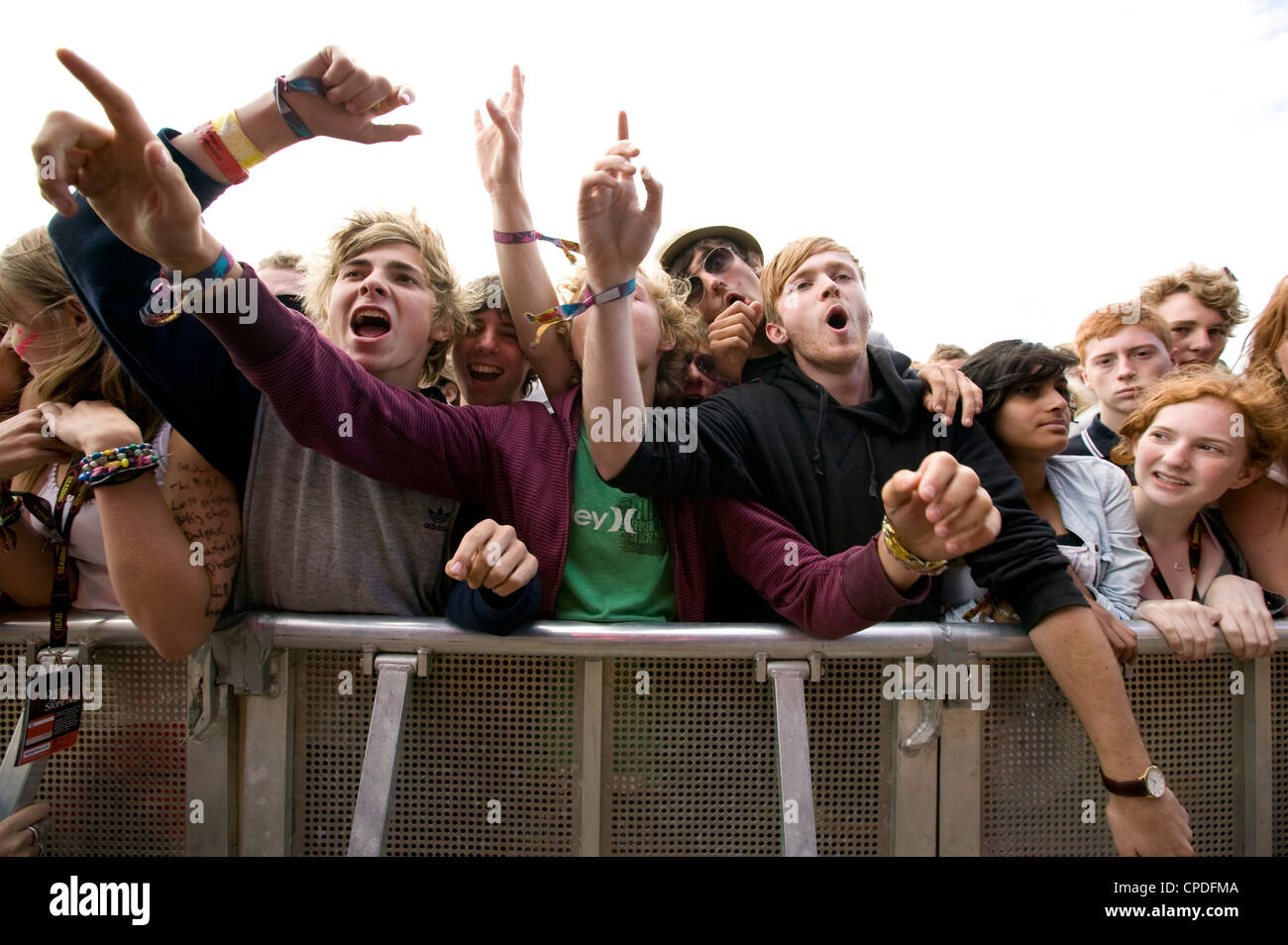 Crowd in front row screaming at a music concert Stock Photo - Alamy
