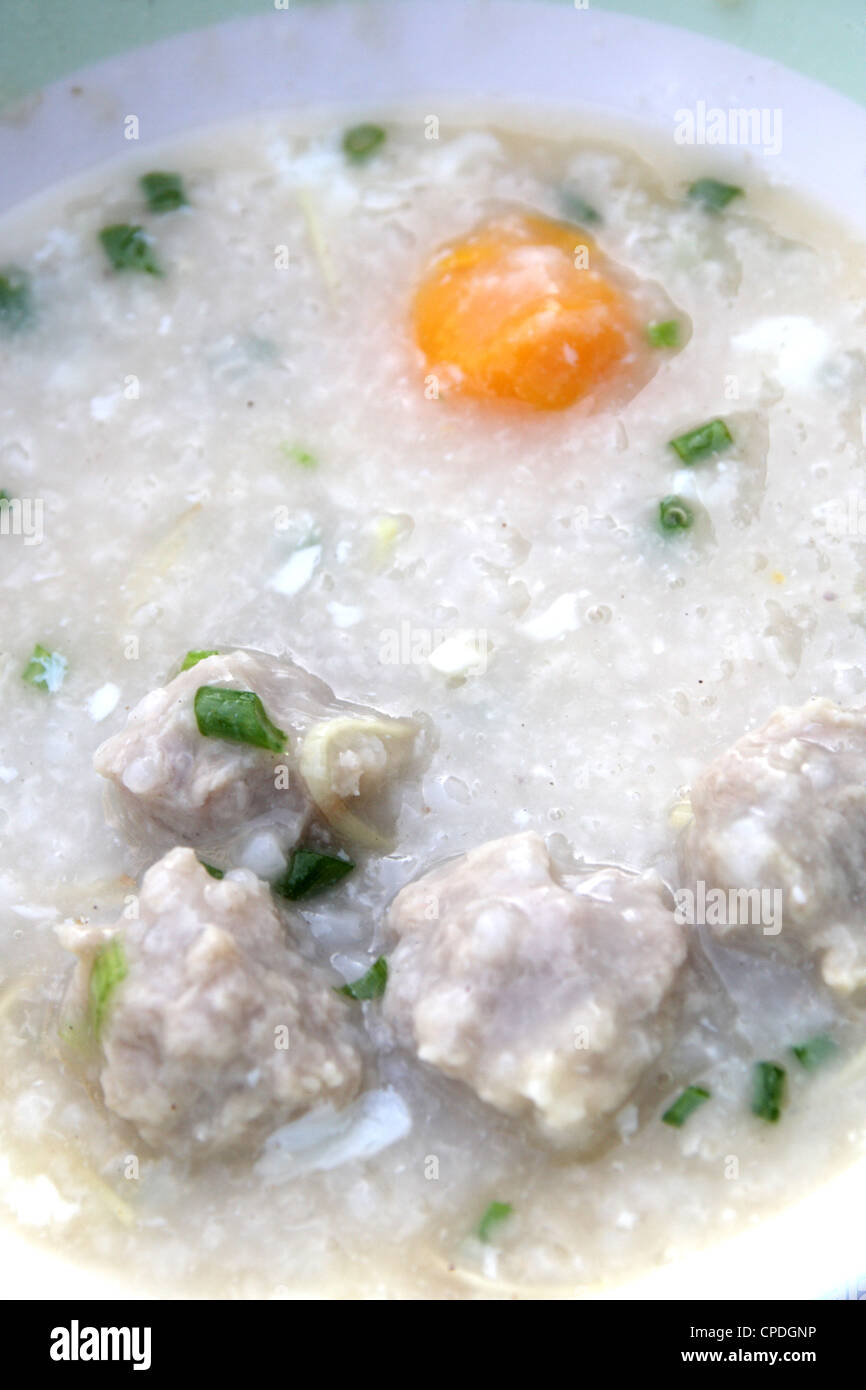 Rice soup with egg and mince pork Stock Photo - Alamy