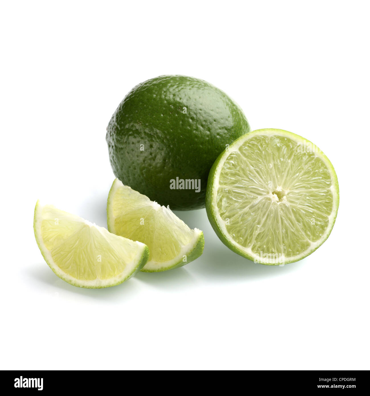 Lemon with half and quarter pieces on white Stock Photo - Alamy