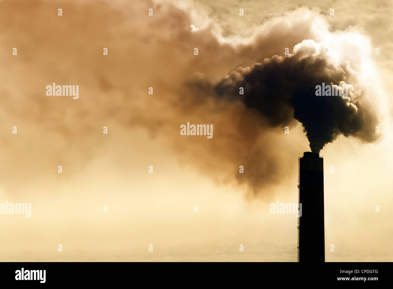 Heavy smoke from industrial chimney polluting the environment Stock ...