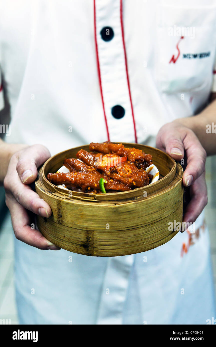 Dim sum preparation in a restaurant kitchen in Hong Kong, China, Asia ...