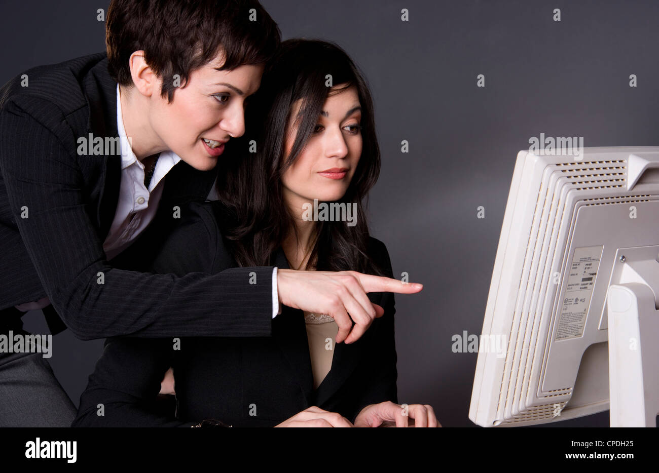A women and Supervisor points out the way Stock Photo - Alamy