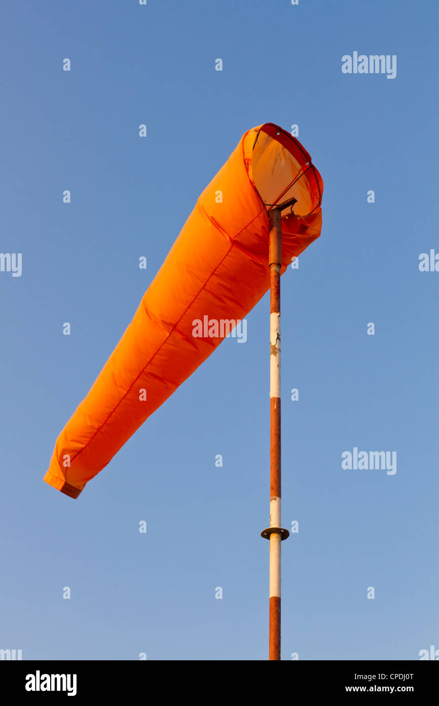 Wind sock with blue sky background Stock Photo - Alamy