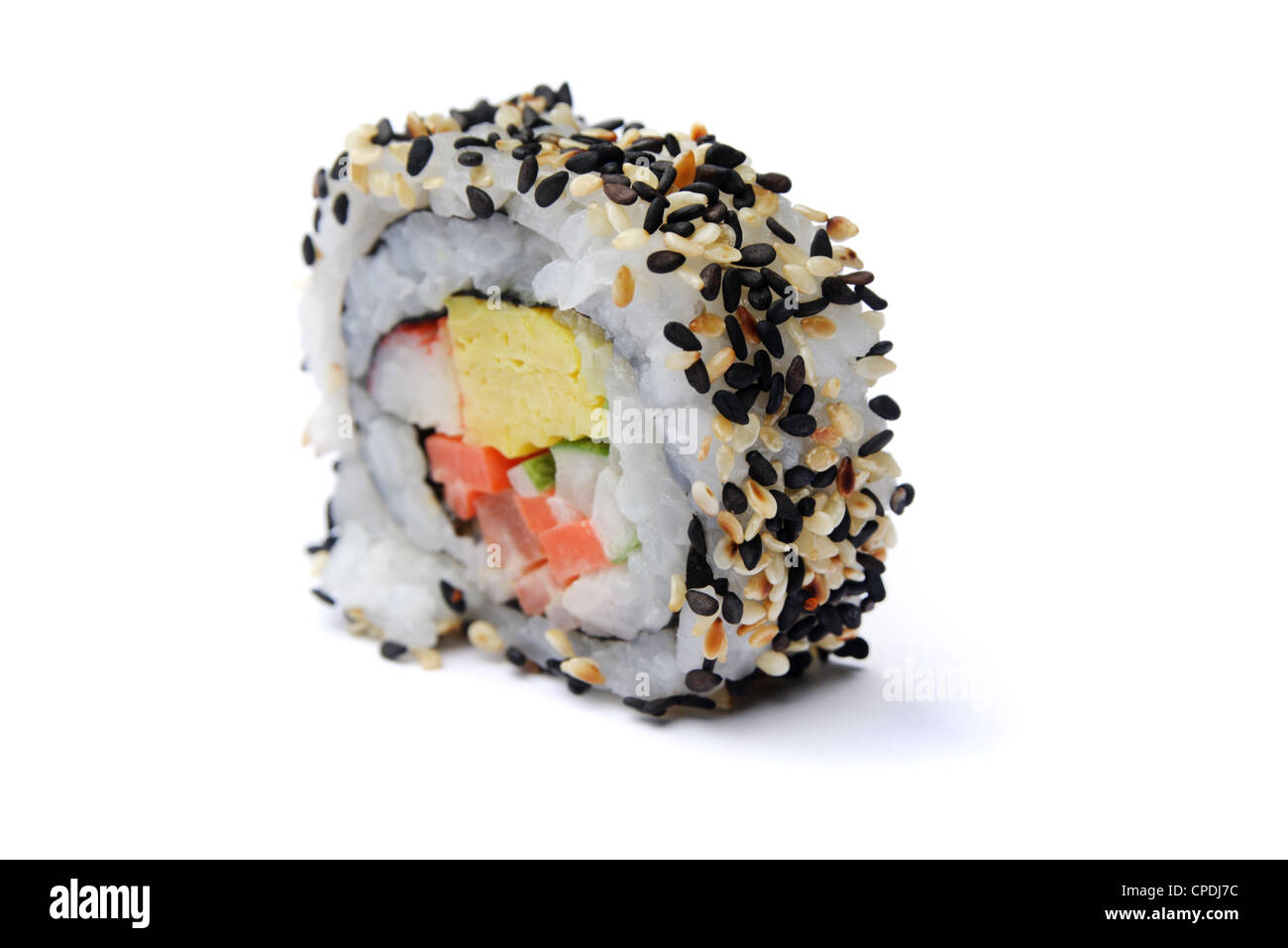 Maki sushi roll with sesame border Stock Photo - Alamy