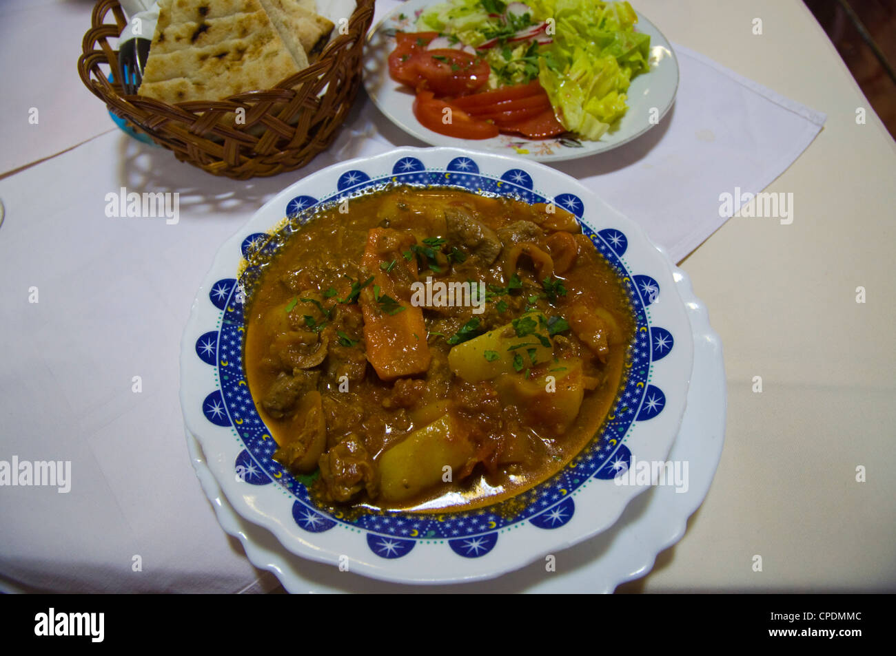 Typical traditional local meat and vegetable stew in restaurant above ...