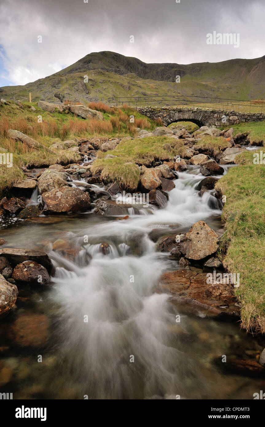 Torver Beck and traditional slate packhorse bridge over the Walna Scar ...