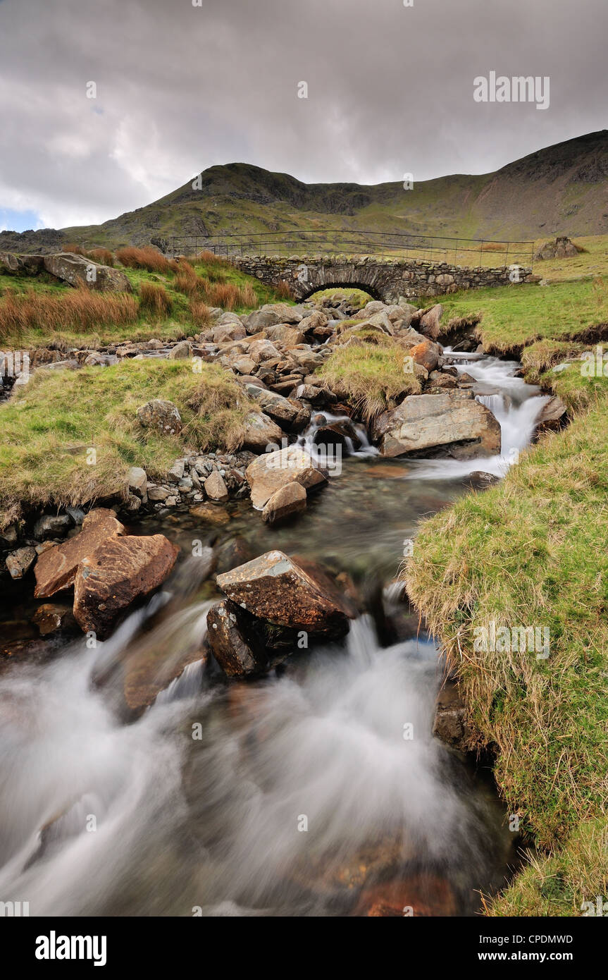 Torver Beck and traditional slate packhorse bridge over the Walna Scar ...