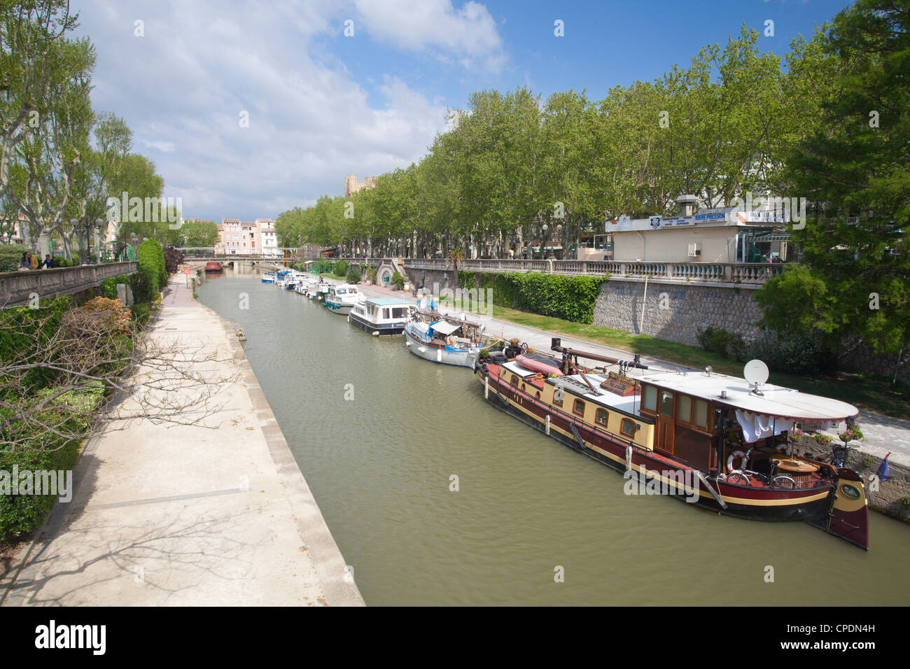 River boats on the Canal de la Robine, Narbonne, Languedoc-Roussillon ...