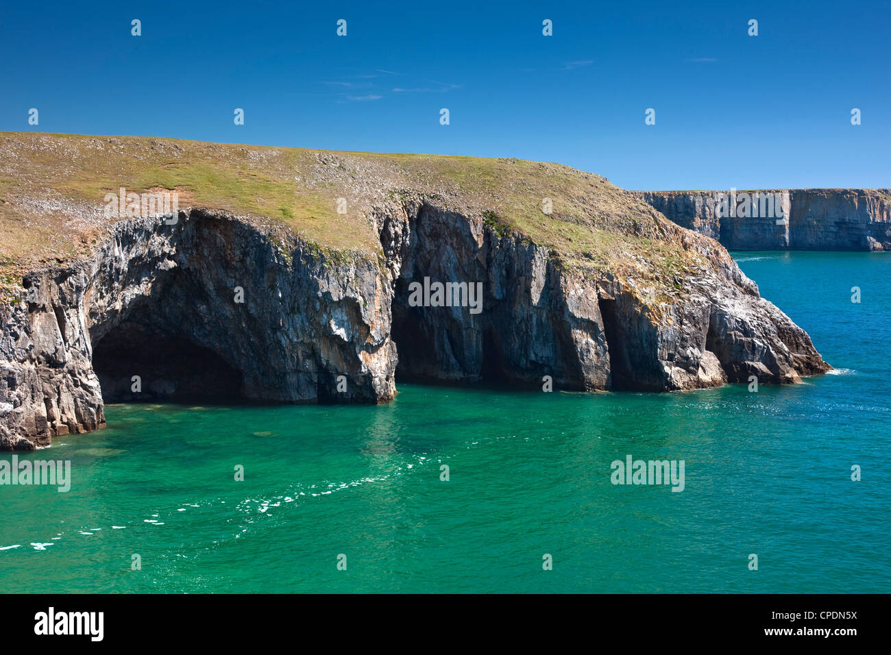 Caves at Raming Hole, looking towards Stackpole Head, Pembrokeshire ...