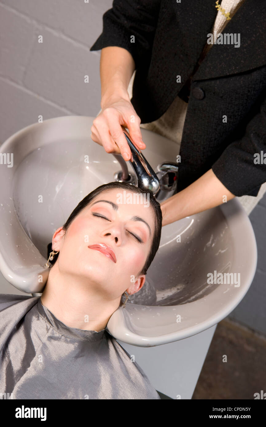 A day at the salon starts with shampoo Stock Photo - Alamy