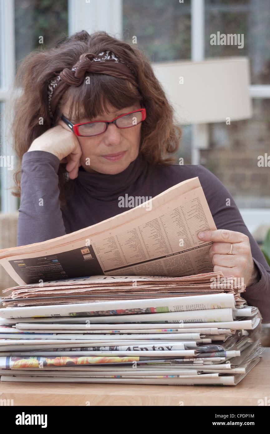 Newspapers vertical hi-res stock photography and images - Alamy