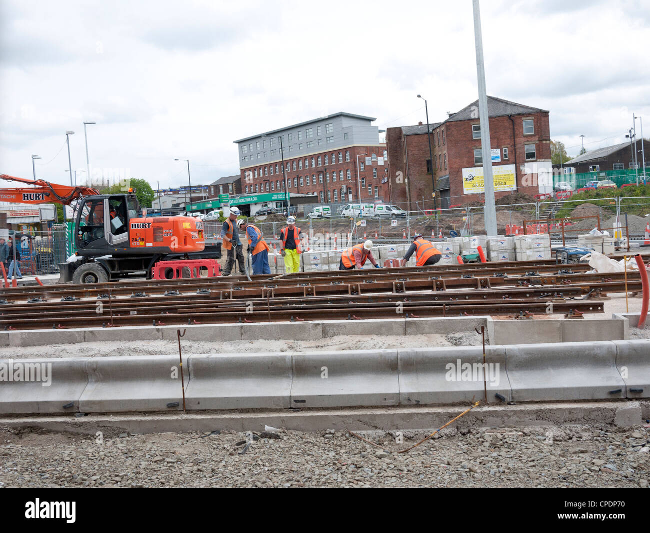 Engineers working on the new Metrolink Tramway system, Oldham, Greater ...