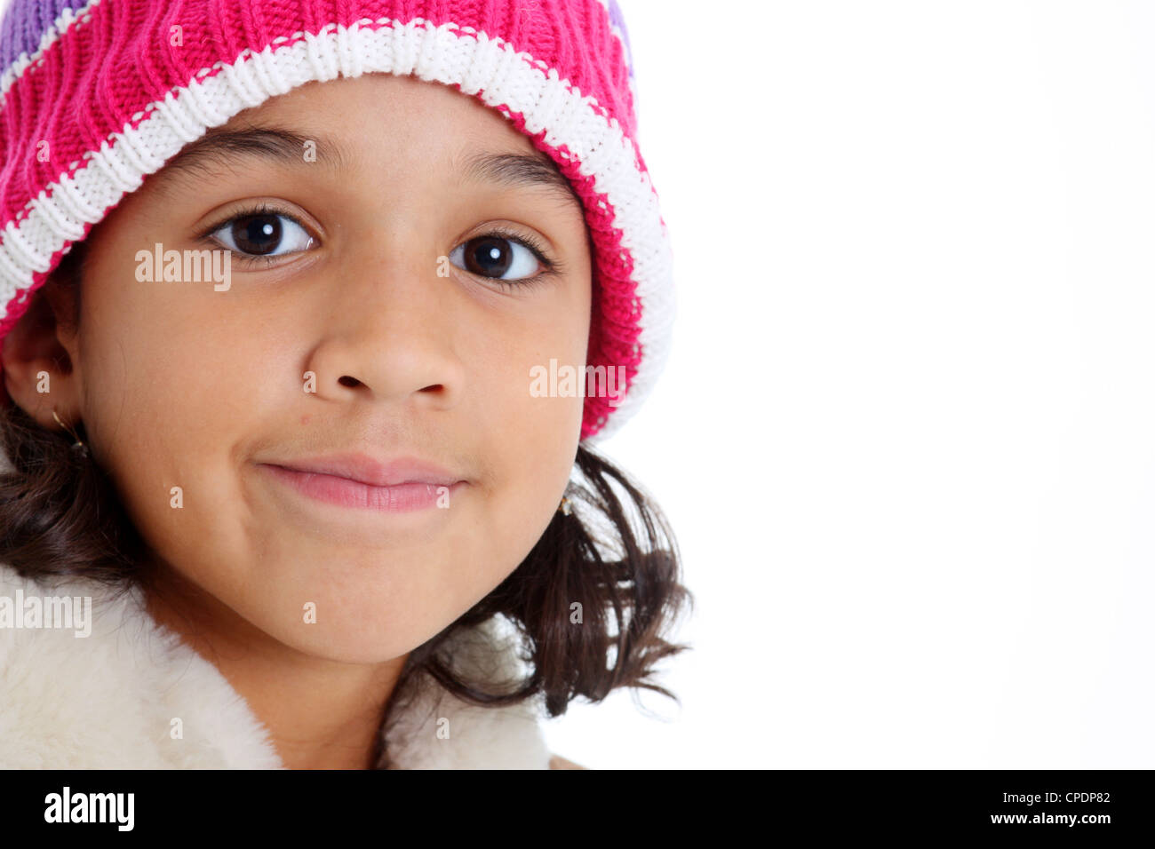Young Girl Posing Against A White Background Stock Photo - Alamy