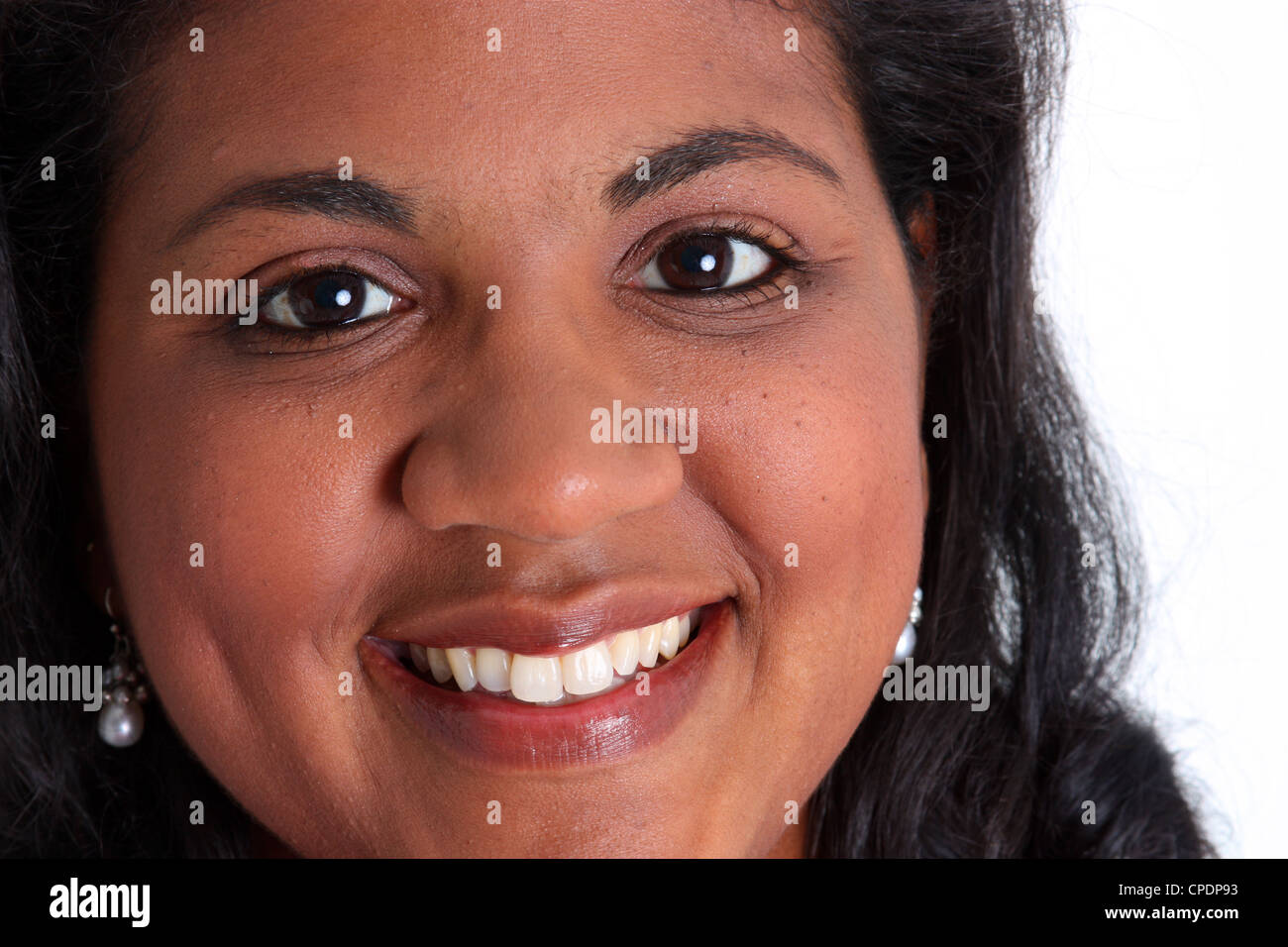 Portrait of a minority woman on white background Stock Photo - Alamy