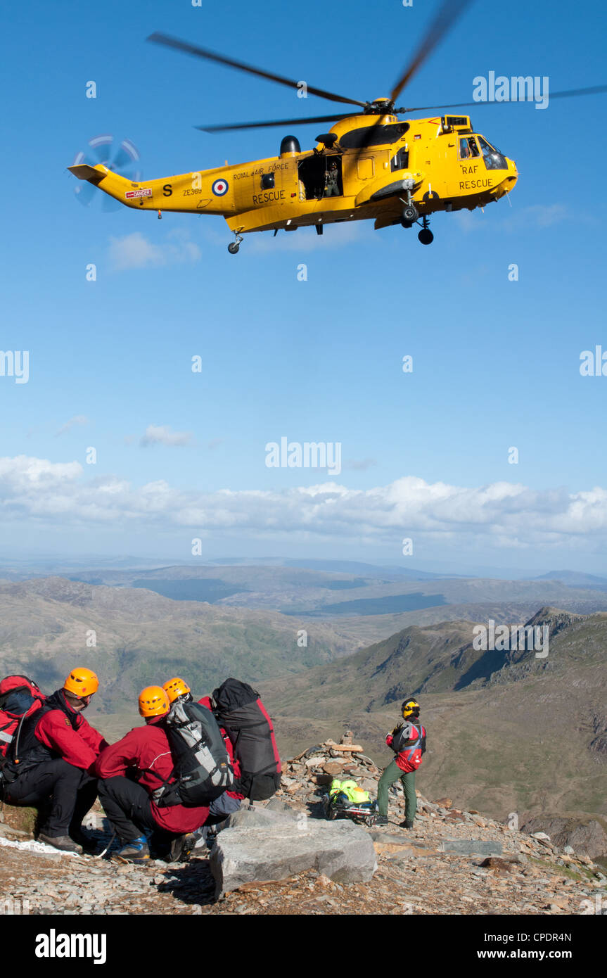 Sea King Helicopter from RAF Valley, assisted by Mountain Rescue Teams ...