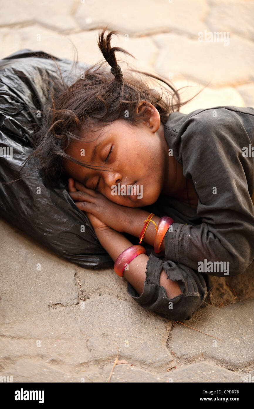 Homeless child sleep hi-res stock photography and images - Alamy