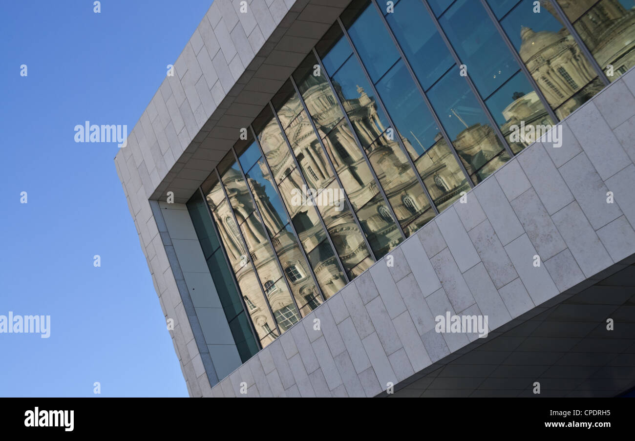 Royal Liver Building reflected in the Museum of Liverpool glass facade ...