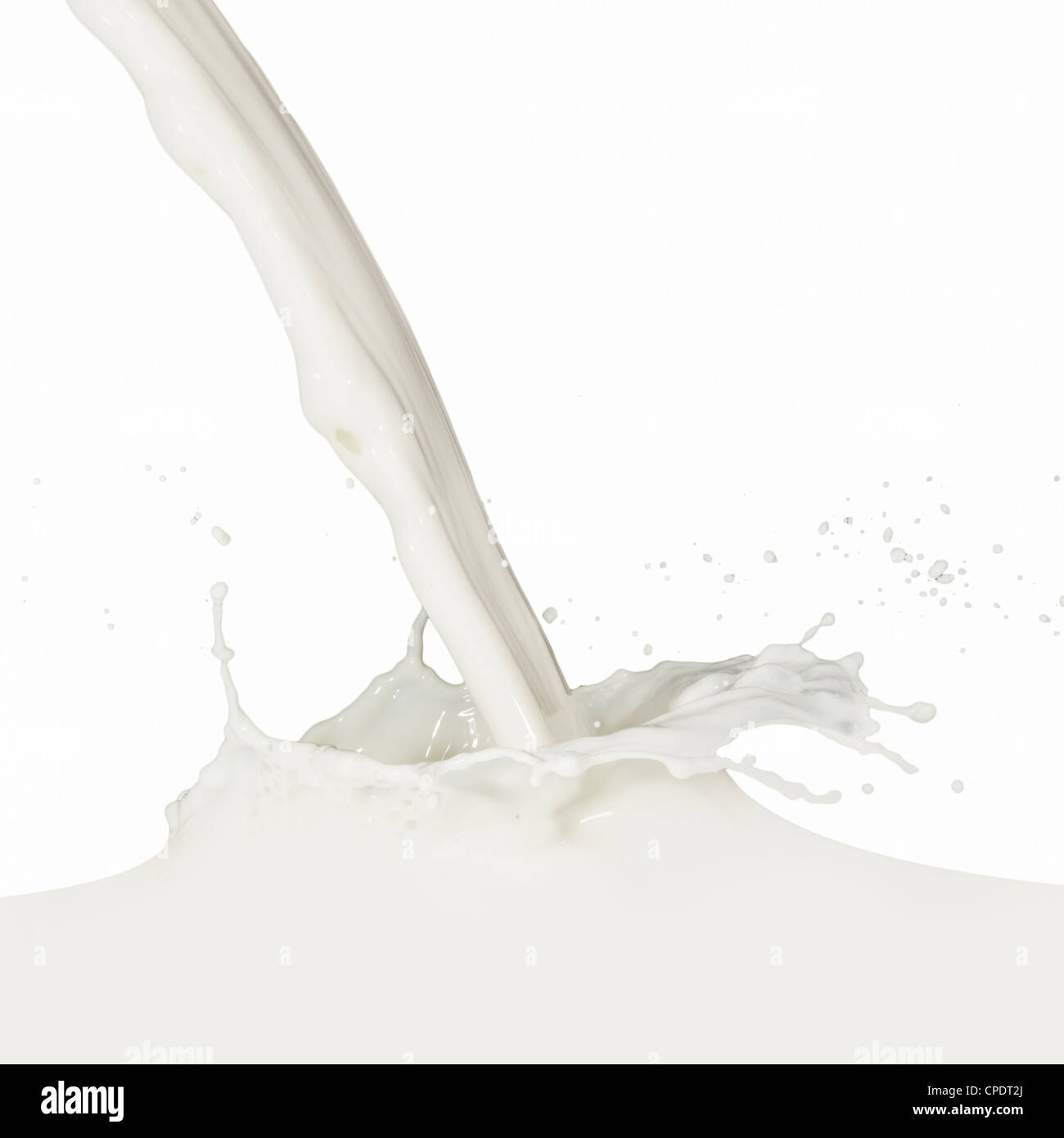 splashing milk isolated on white background Stock Photo - Alamy