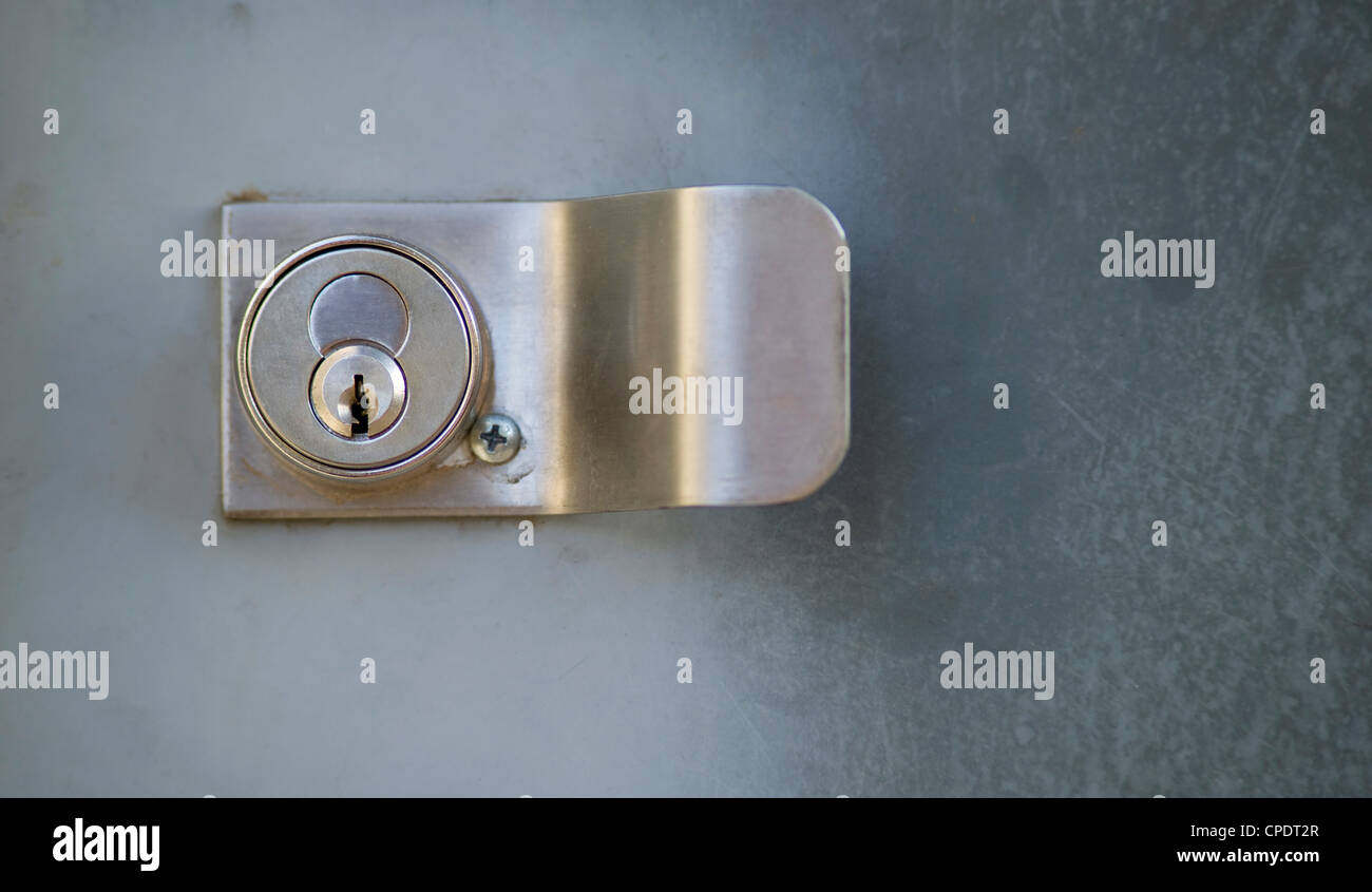 Lock on a metal door Stock Photo - Alamy