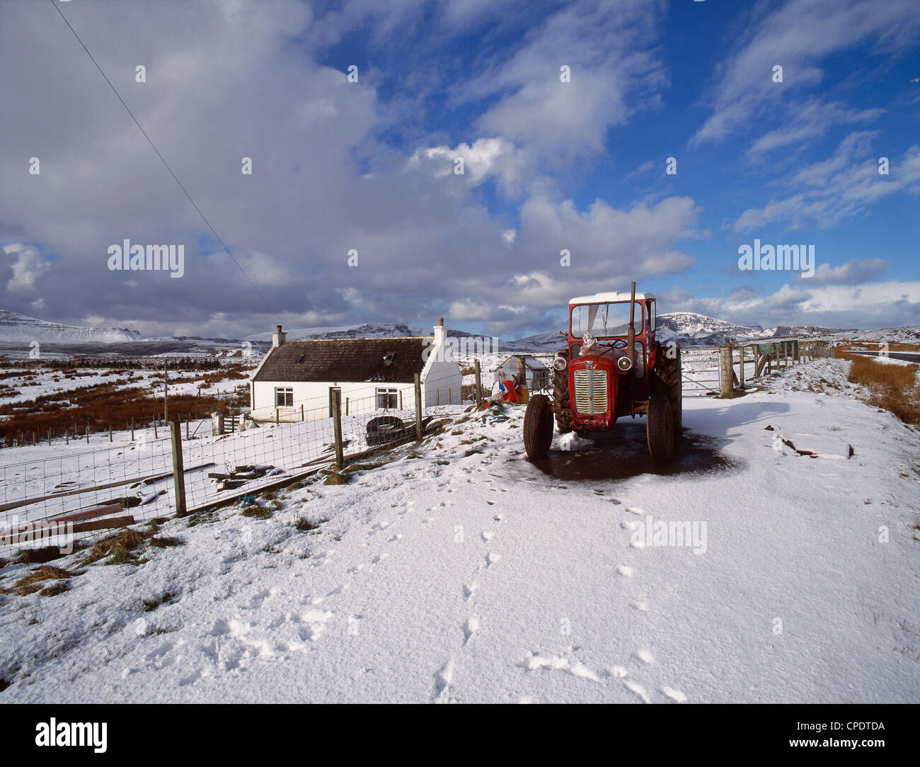 Croft-house and tractor in a wintry landscape near Valtos, Trotternish ...