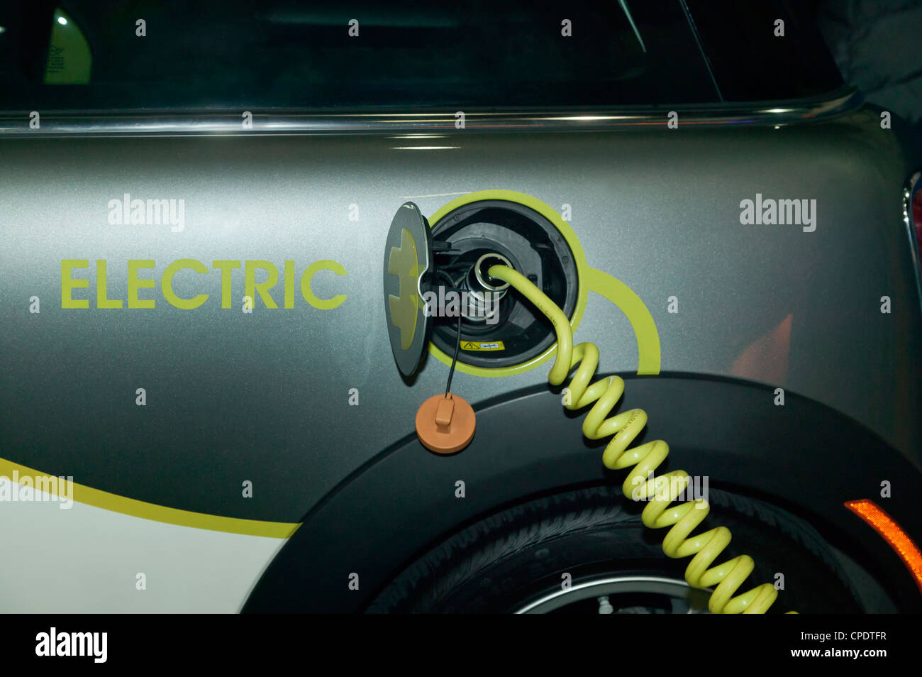 Close-up of the charging port of a prototype electric Mini, on show at ...