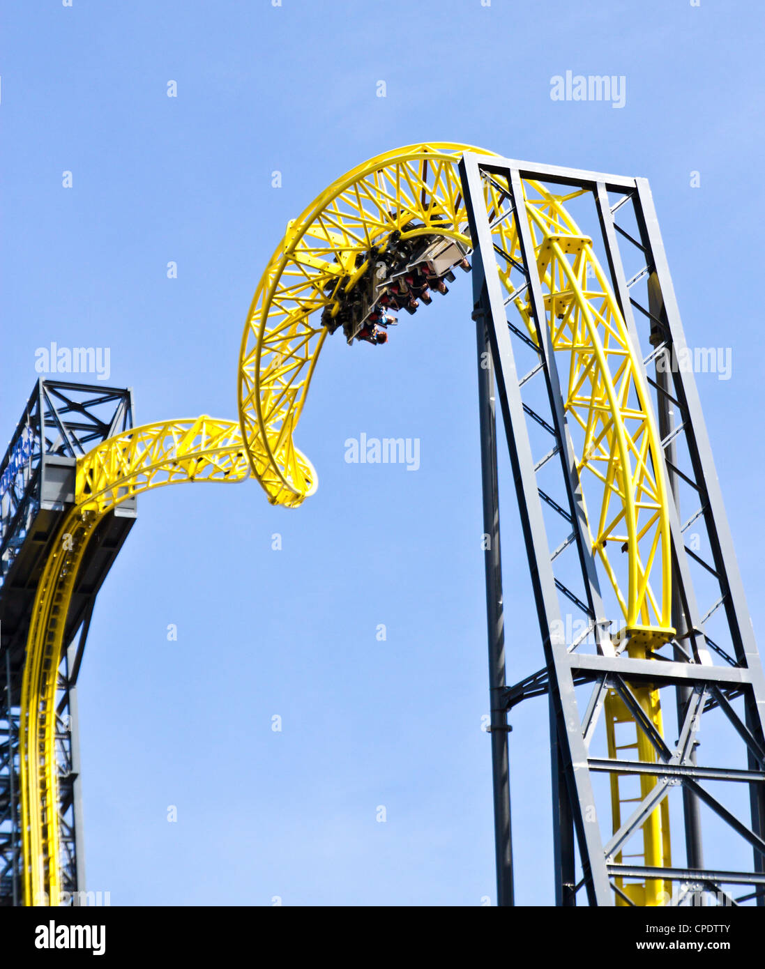 yellow roller coaster Stock Photo - Alamy