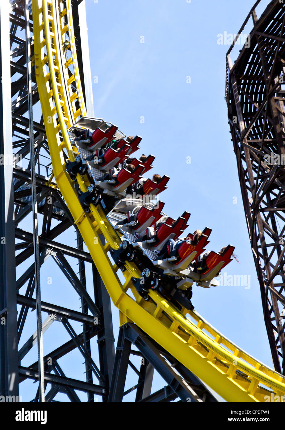 yellow roller coaster Stock Photo - Alamy