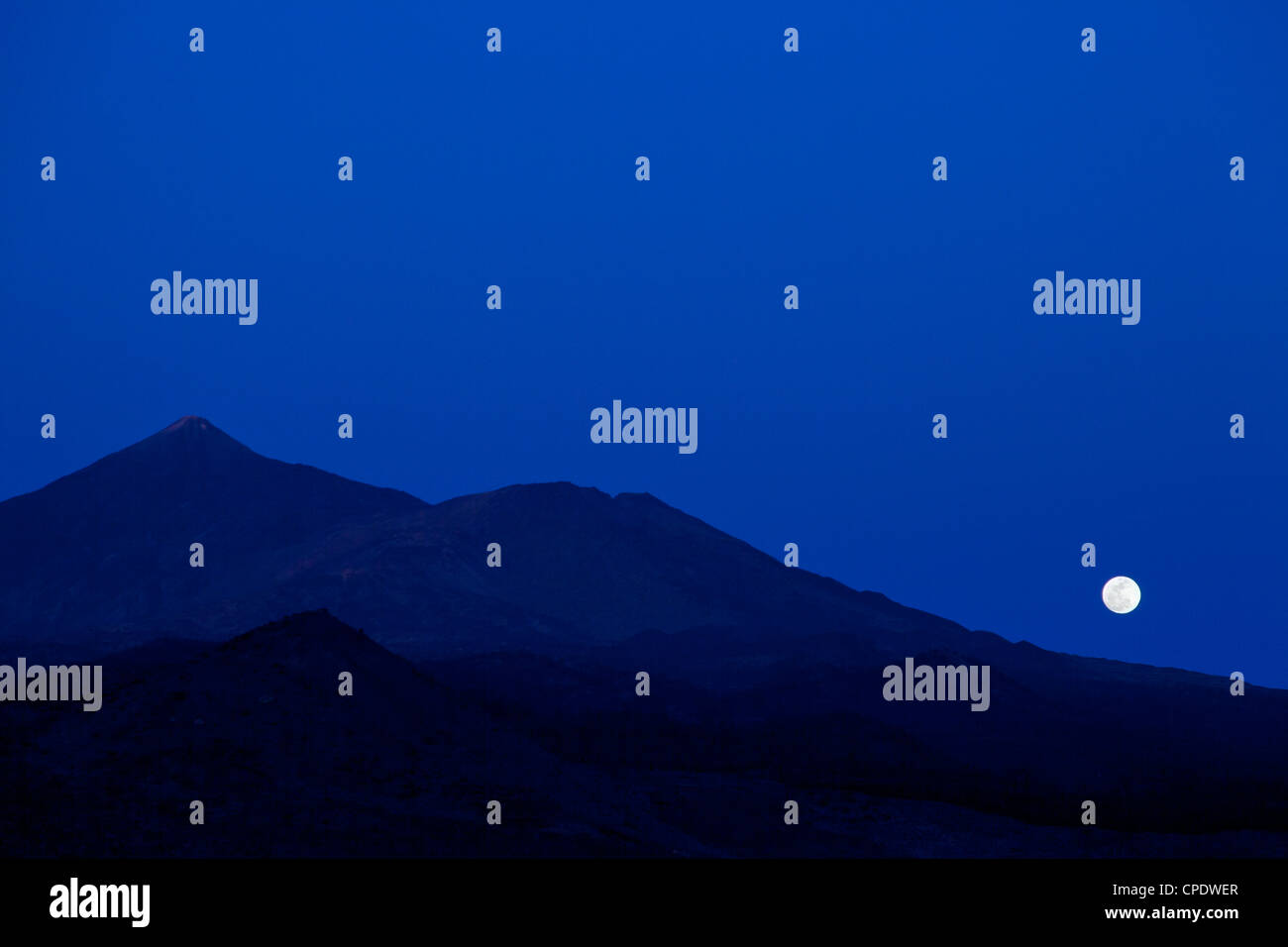 Full moon rising next to mount Teide at perigee in Tenerife, Canary ...