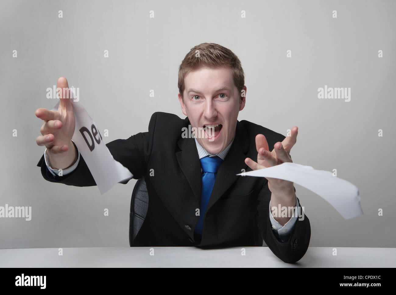 Ripped suit hi-res stock photography and images - Alamy