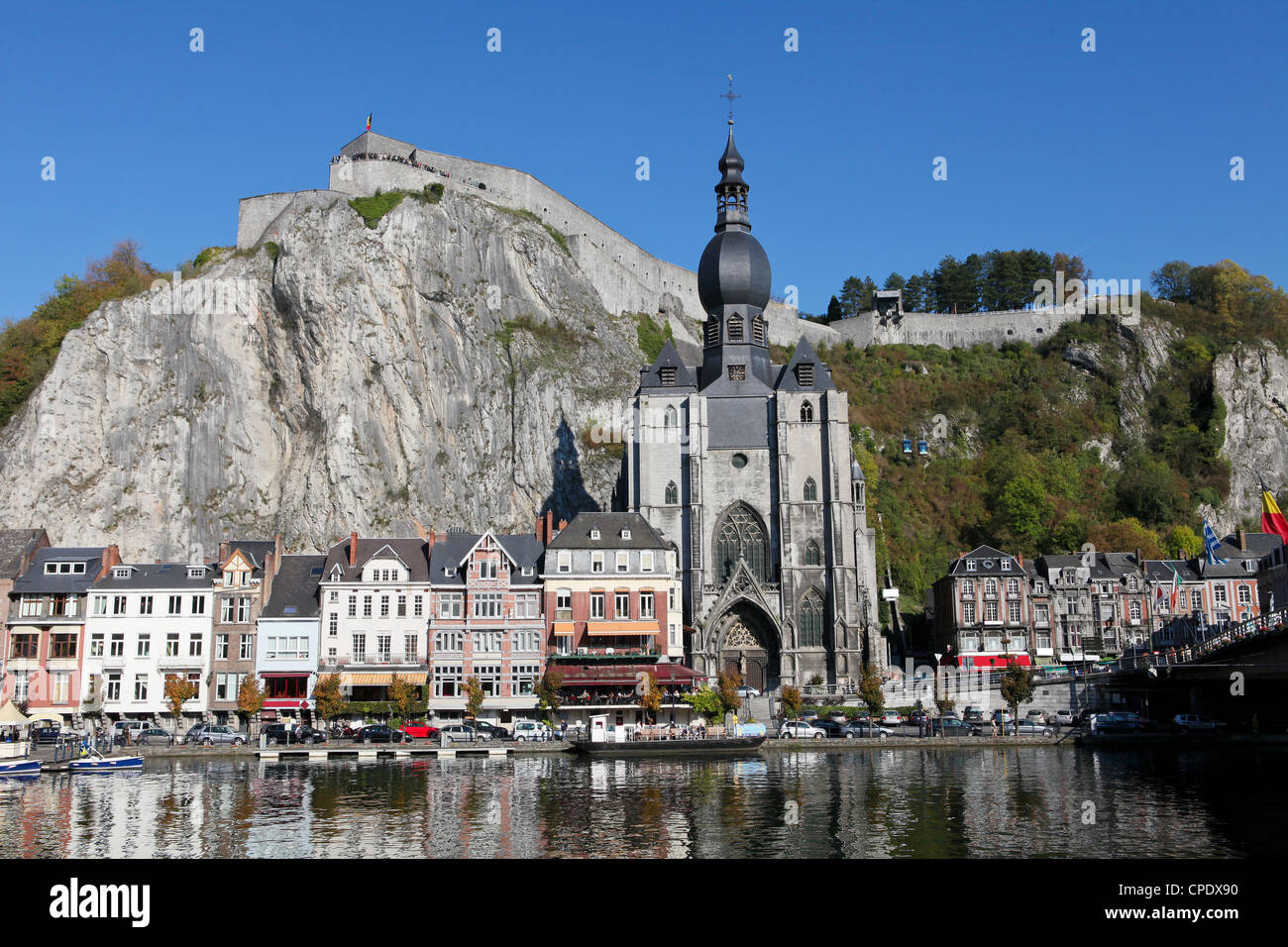 The center of the town of Dinant with the citadelle on the rock and ...