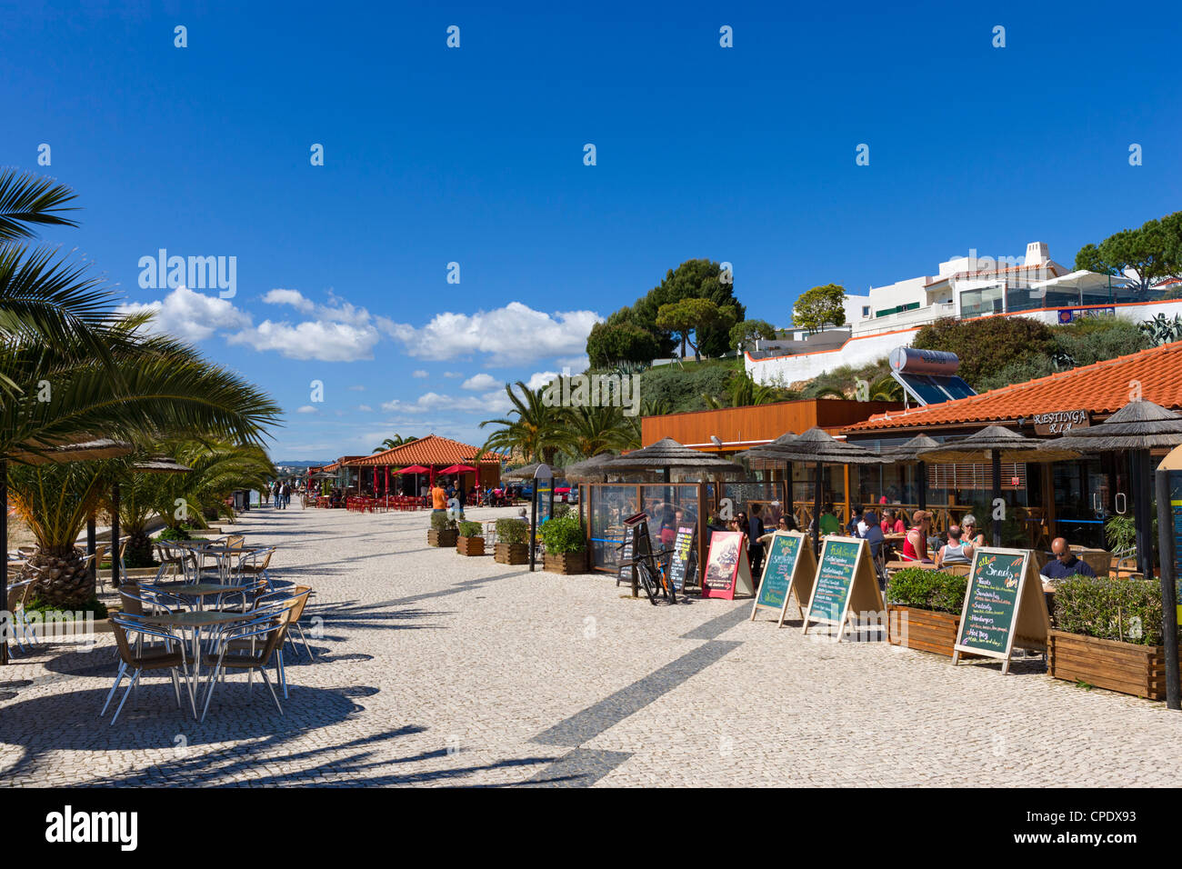 Seafront restaurants by the harbour in the resort of Alvor, near ...