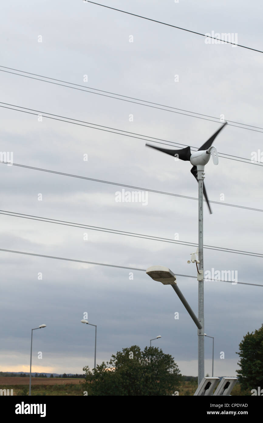 windmills for electric power production and electrical Stock Photo - Alamy