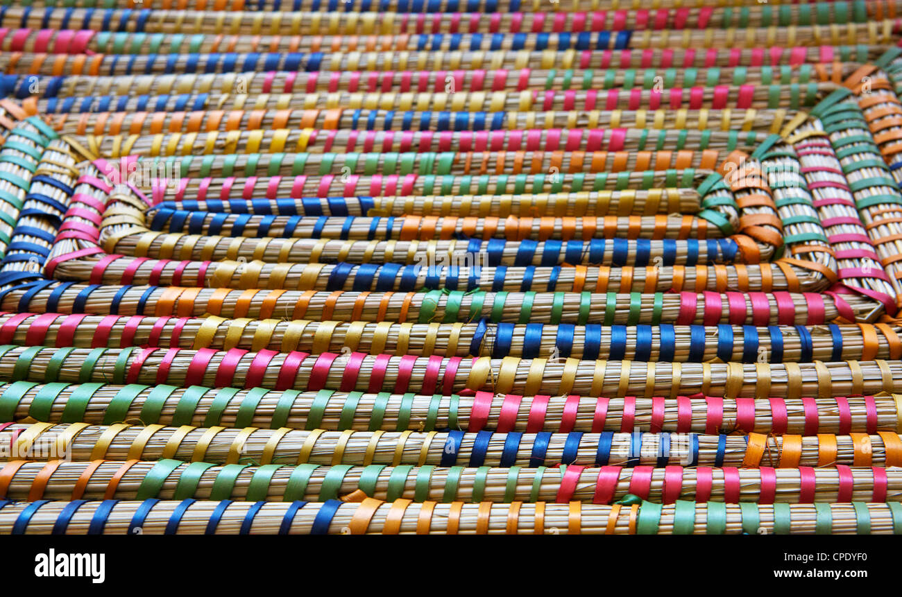Many color weaved straw basket top in perspective Stock Photo - Alamy