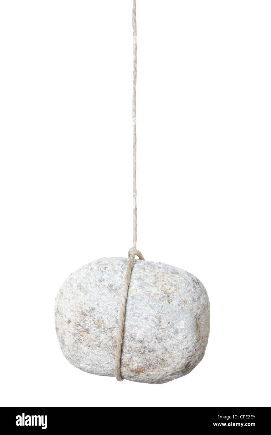 Stone hanging on a string Stock Photo - Alamy
