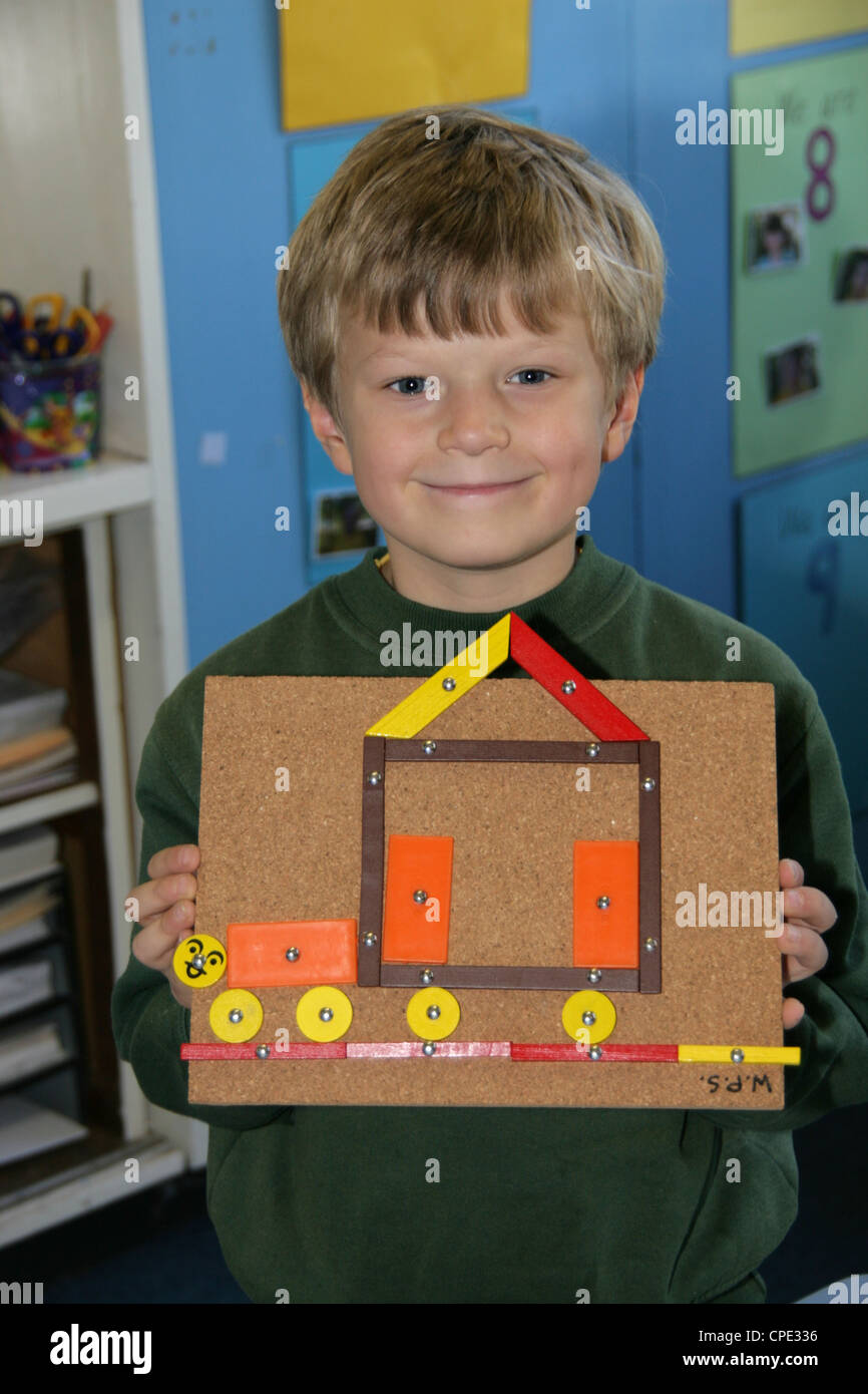Young boy displays shape picture Stock Photo - Alamy