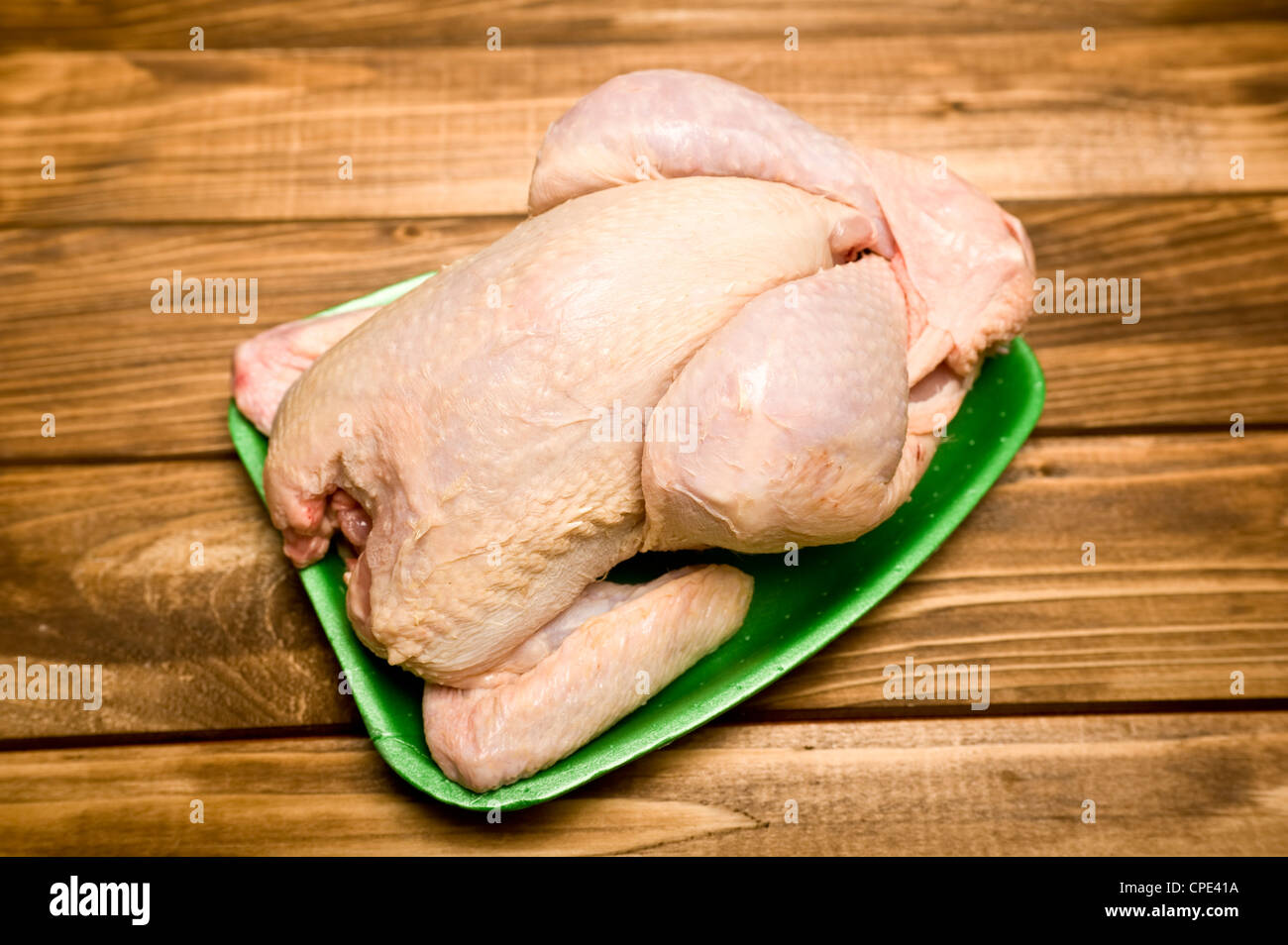 a raw chicken uncooked Stock Photo - Alamy