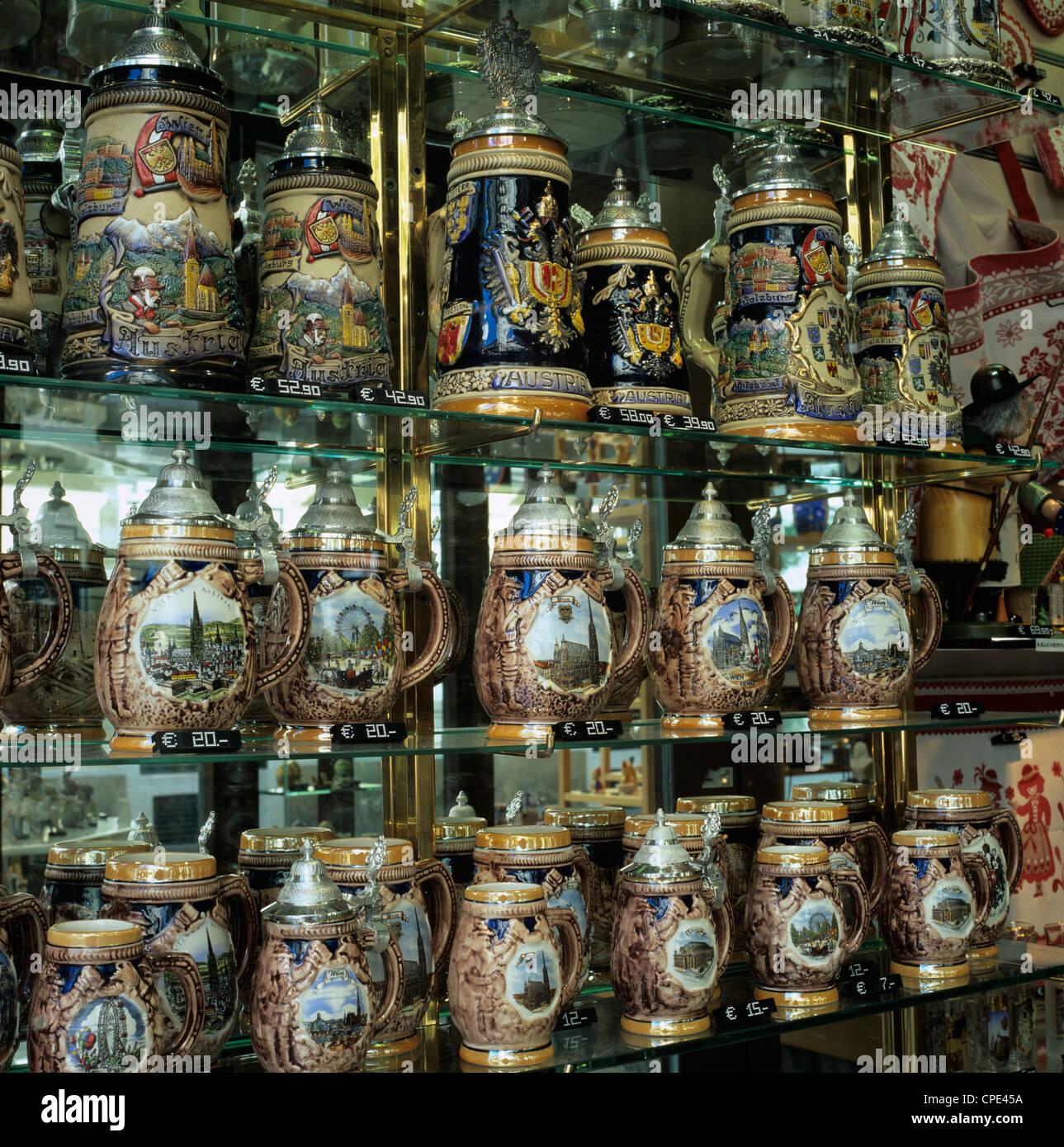 Souvenir shop window display of traditional Austrian beer tankards ...