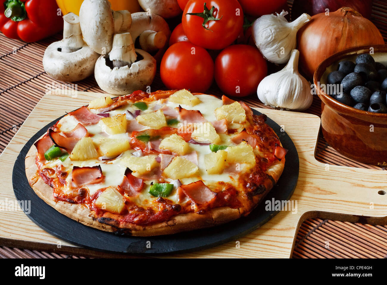 Ham and pineapple pizza slice hi-res stock photography and images - Alamy