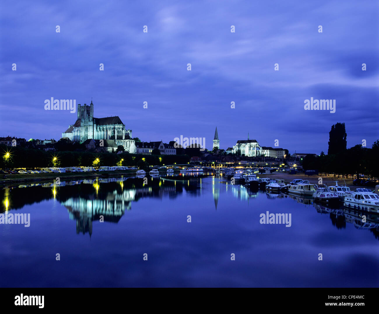 River Yonne and Cathedral (Cathedrale Saint-Etienne d'Auxerre) at dusk ...